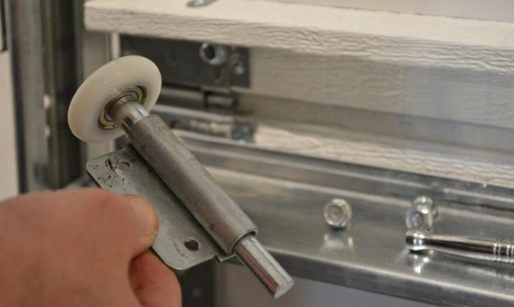 How to Install Garage Door Rollers: Step-by-Step Guide | PrimeGDR
